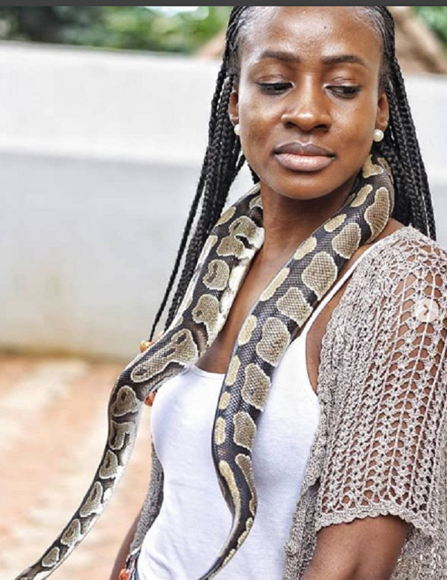 Reality Star, Anto, Spotted With A Huge Python In Benin [Photos]