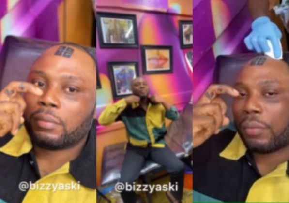 Netizens kick as man tattoos Davido’s 30BG slogan on forehead - Gistlover