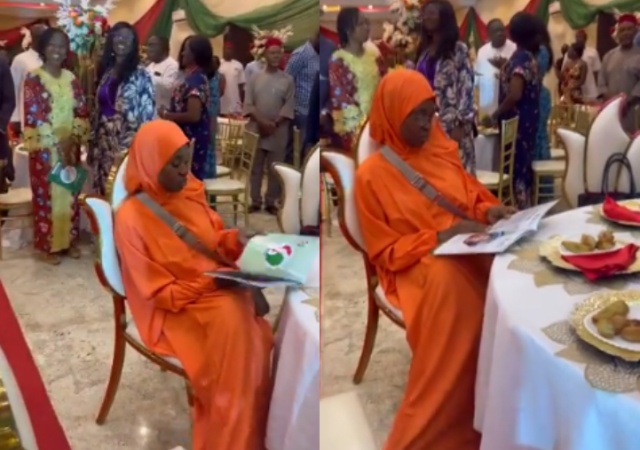 Moment Aisha Yesufu refuses to stand up and sing the new National ...
