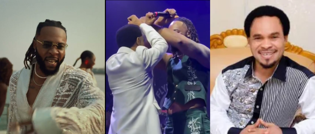 Fans React As Flavour And Odumeje Show Unusual Hand Sign On Stage ...